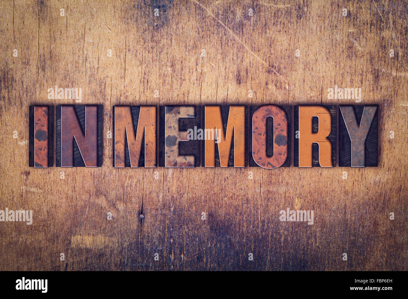 The word "In Memory" written in dirty vintage letterpress type on a ...