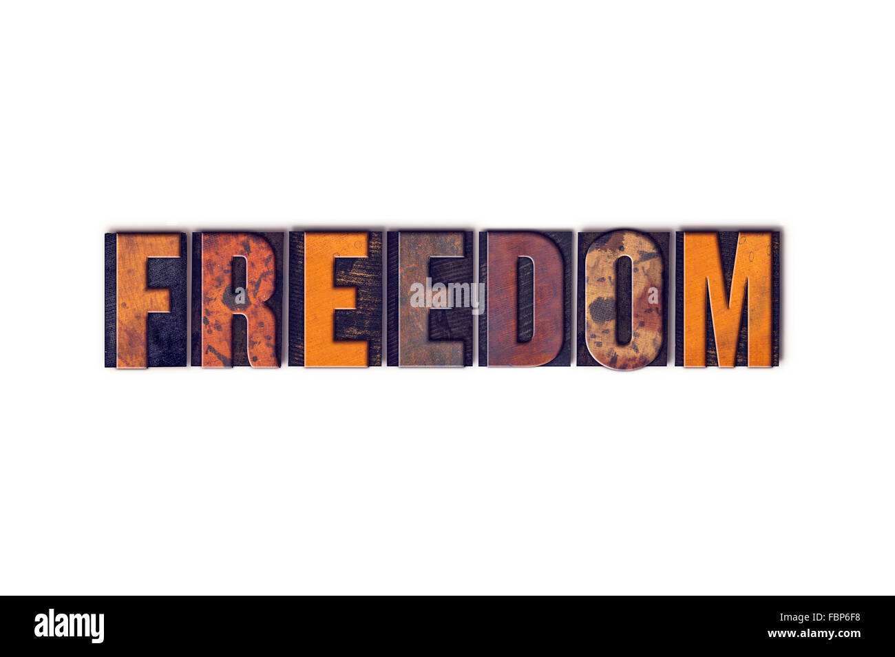 The word "Freedom" written in isolated vintage wooden letterpress type ...