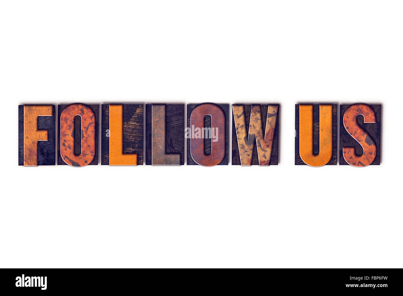 The word "Follow Us" written in isolated vintage wooden letterpress ...