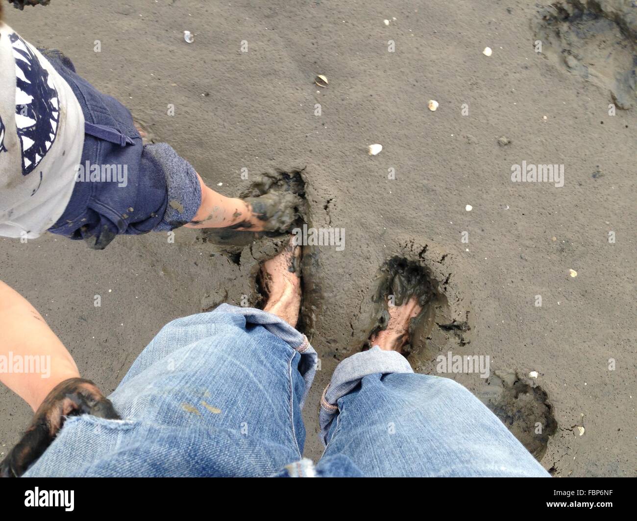 Woman in mud hi-res stock photography and images - Alamy