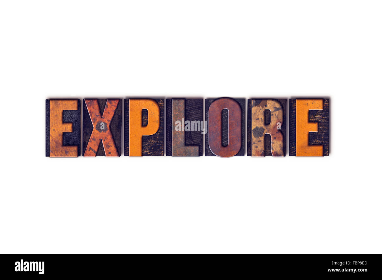 The word "Explore" written in isolated vintage wooden letterpress type ...