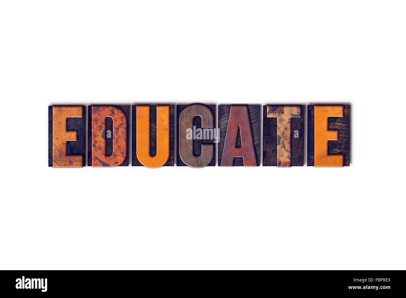 The word "Educate" written in isolated vintage wooden letterpress type ...