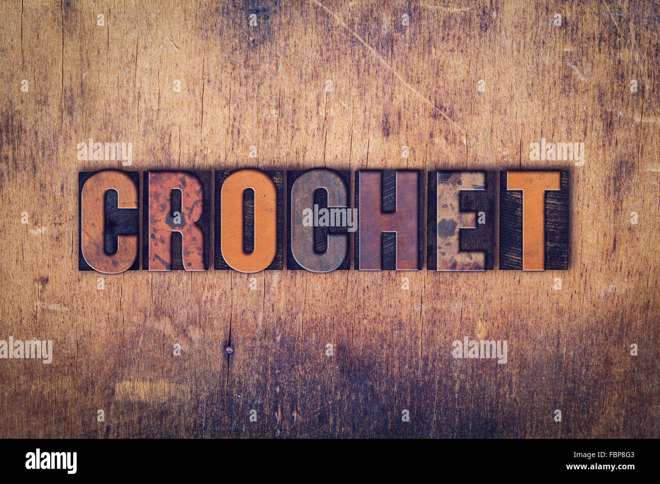 The word "Crochet" written in dirty vintage letterpress type on a aged ...