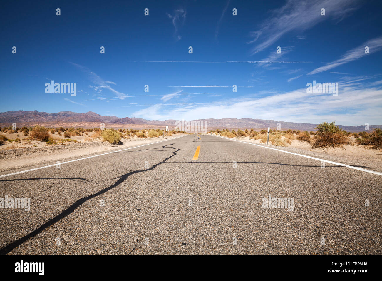 Endless country highway, Death Valley, USA Stock Photo - Alamy