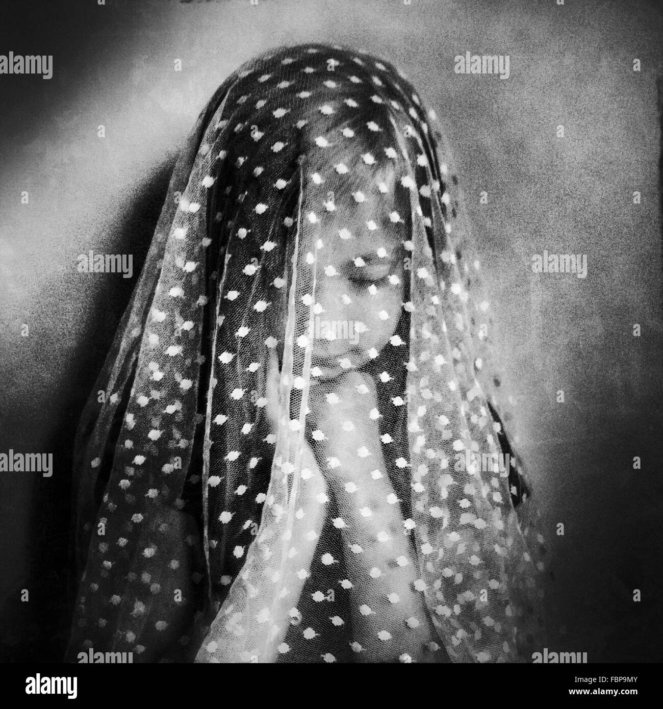 Close-Up Of A Veiled Girl Against The Wall Stock Photo - Alamy