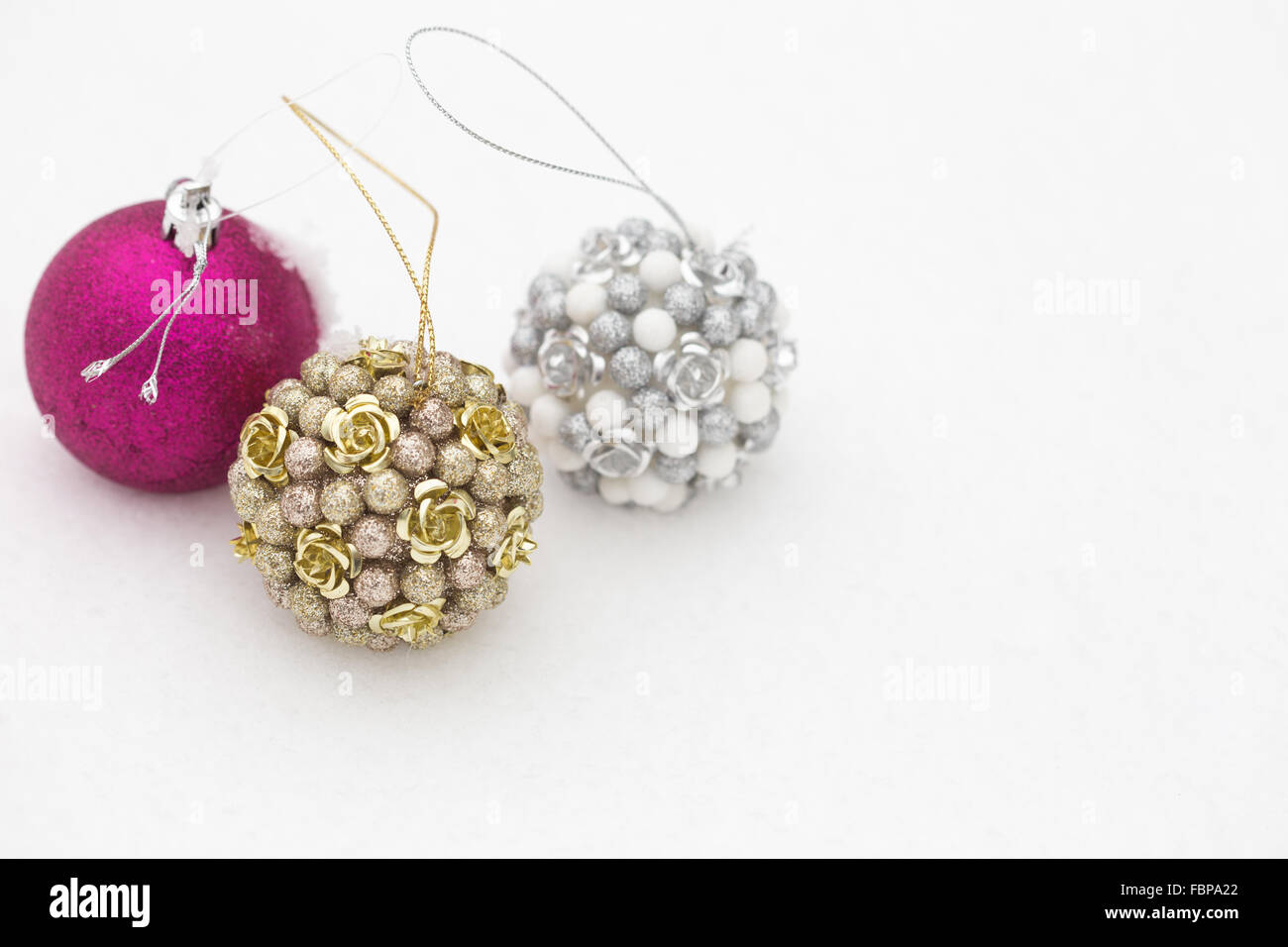 Three decorated christmas balls in the real snow. Winter outdoor Stock ...
