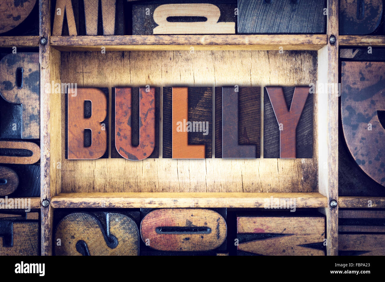 The word "Bully" written in vintage wooden letterpress type Stock Photo ...
