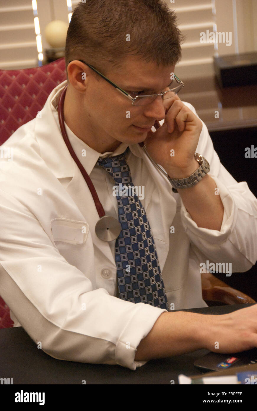 Doctor in various poses Stock Photo - Alamy