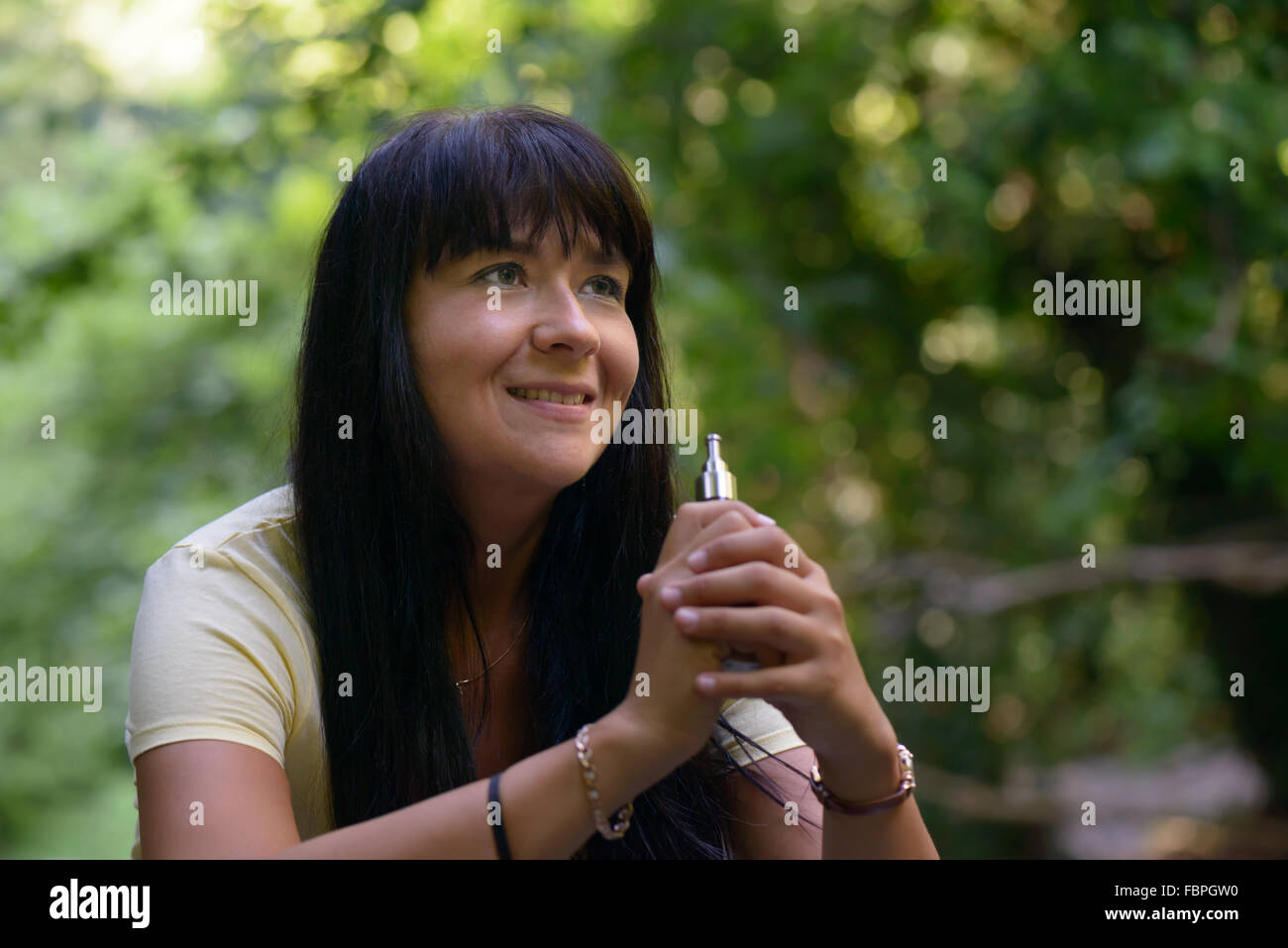 Smiling cigarette girl hi-res stock photography and images - Alamy