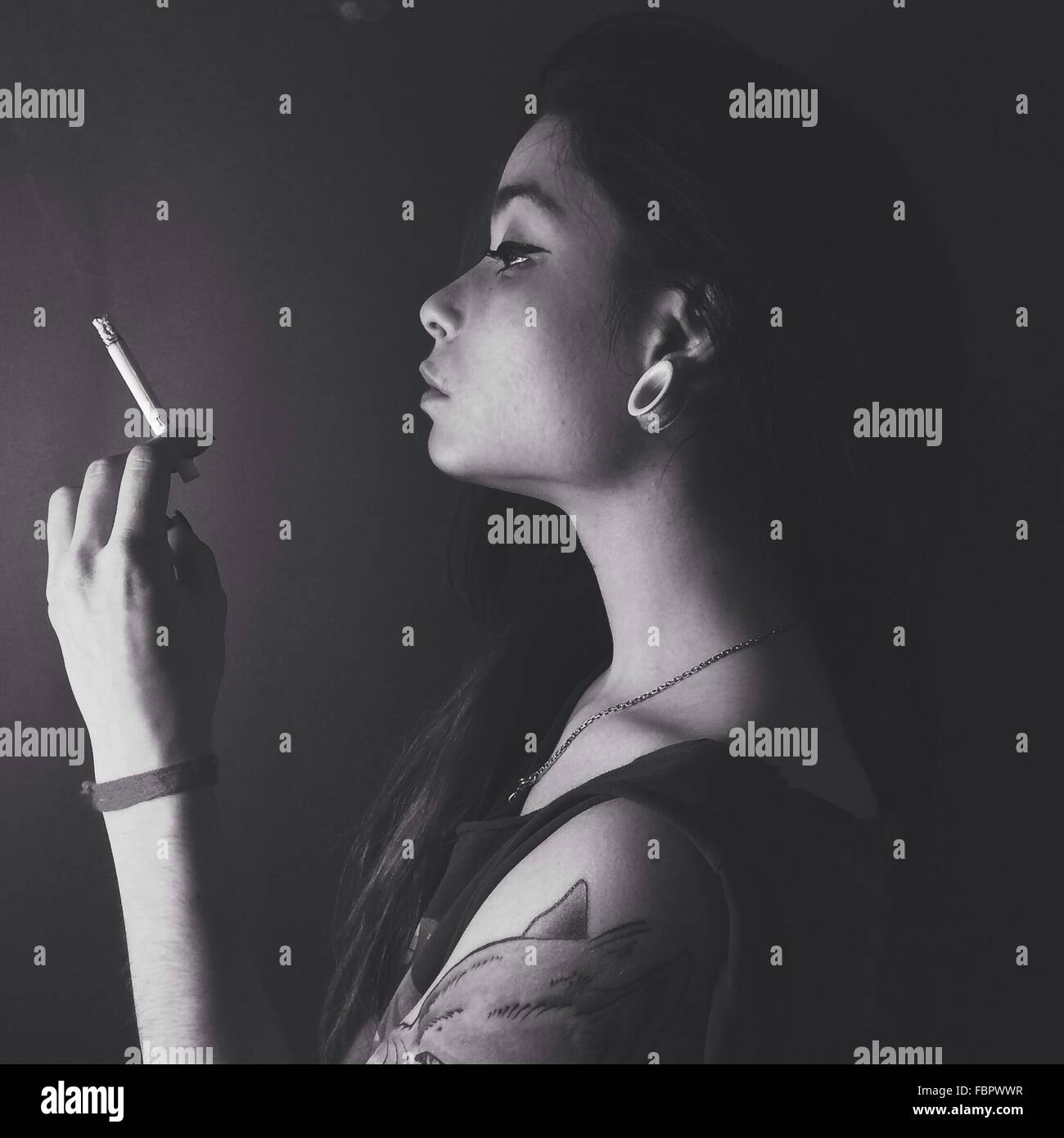 Woman Smoking Side View High Resolution Stock Photography and Images ...