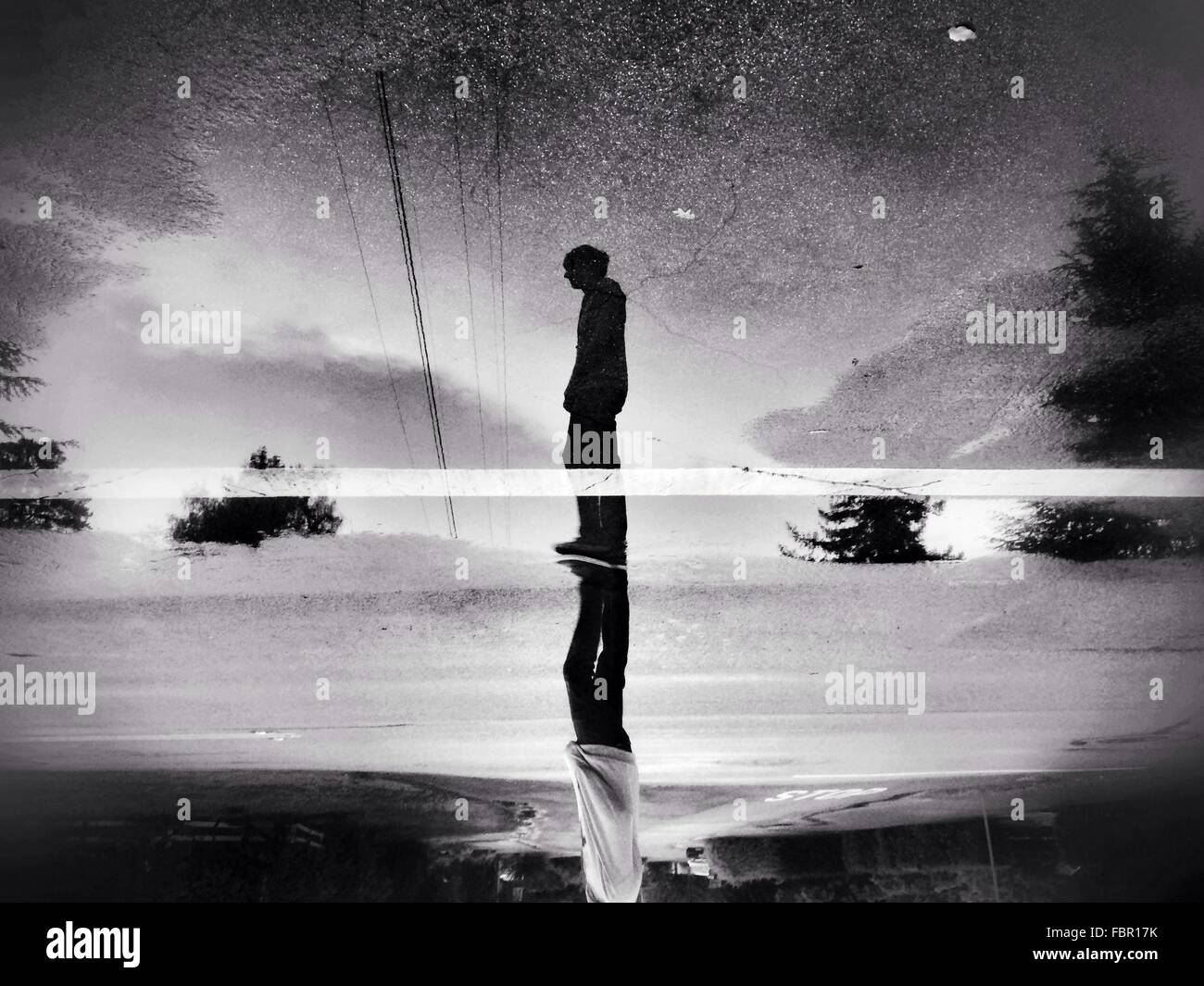 Puddle in the street hi-res stock photography and images - Alamy