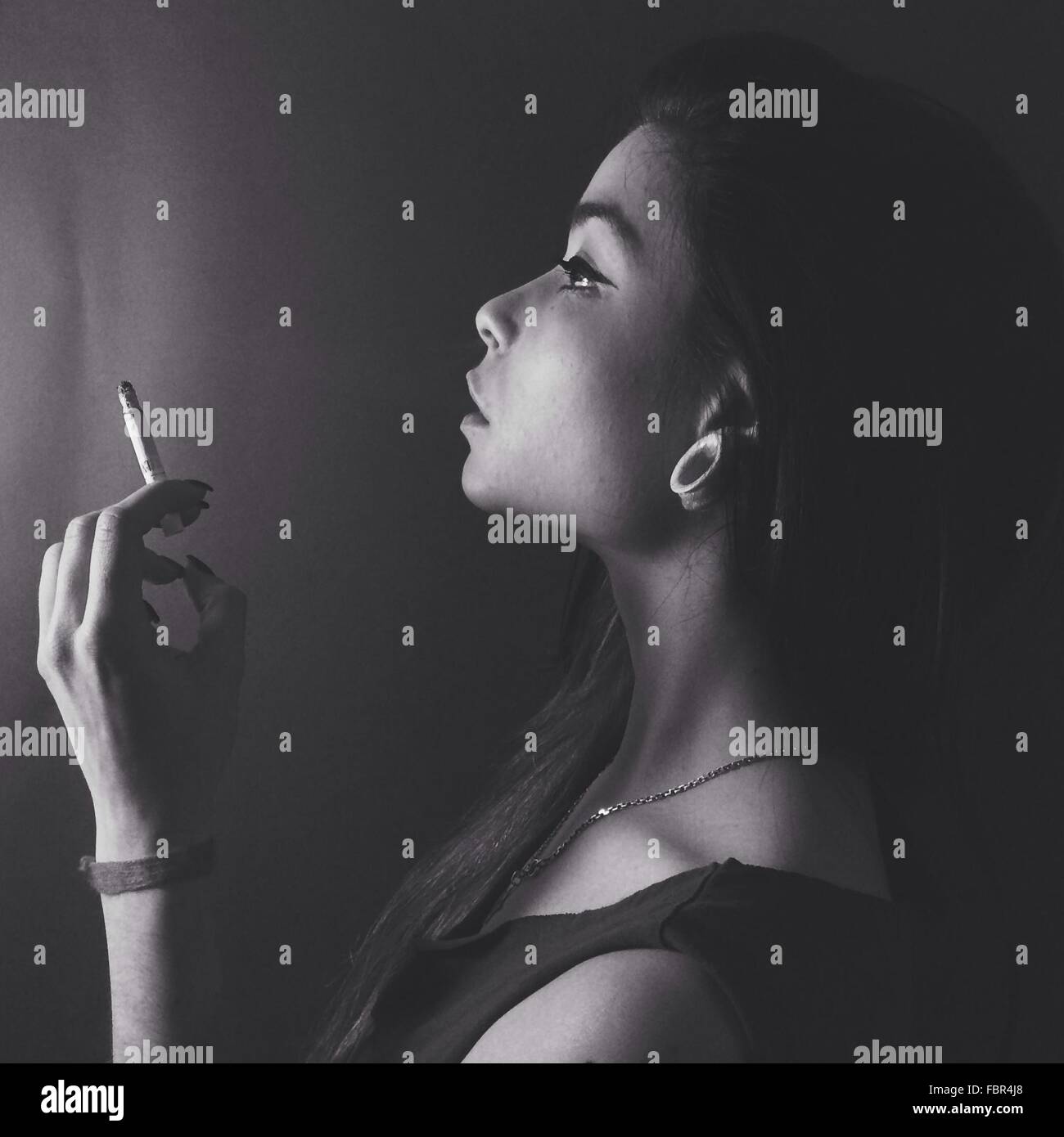 Woman Smoking Side View High Resolution Stock Photography and Images ...
