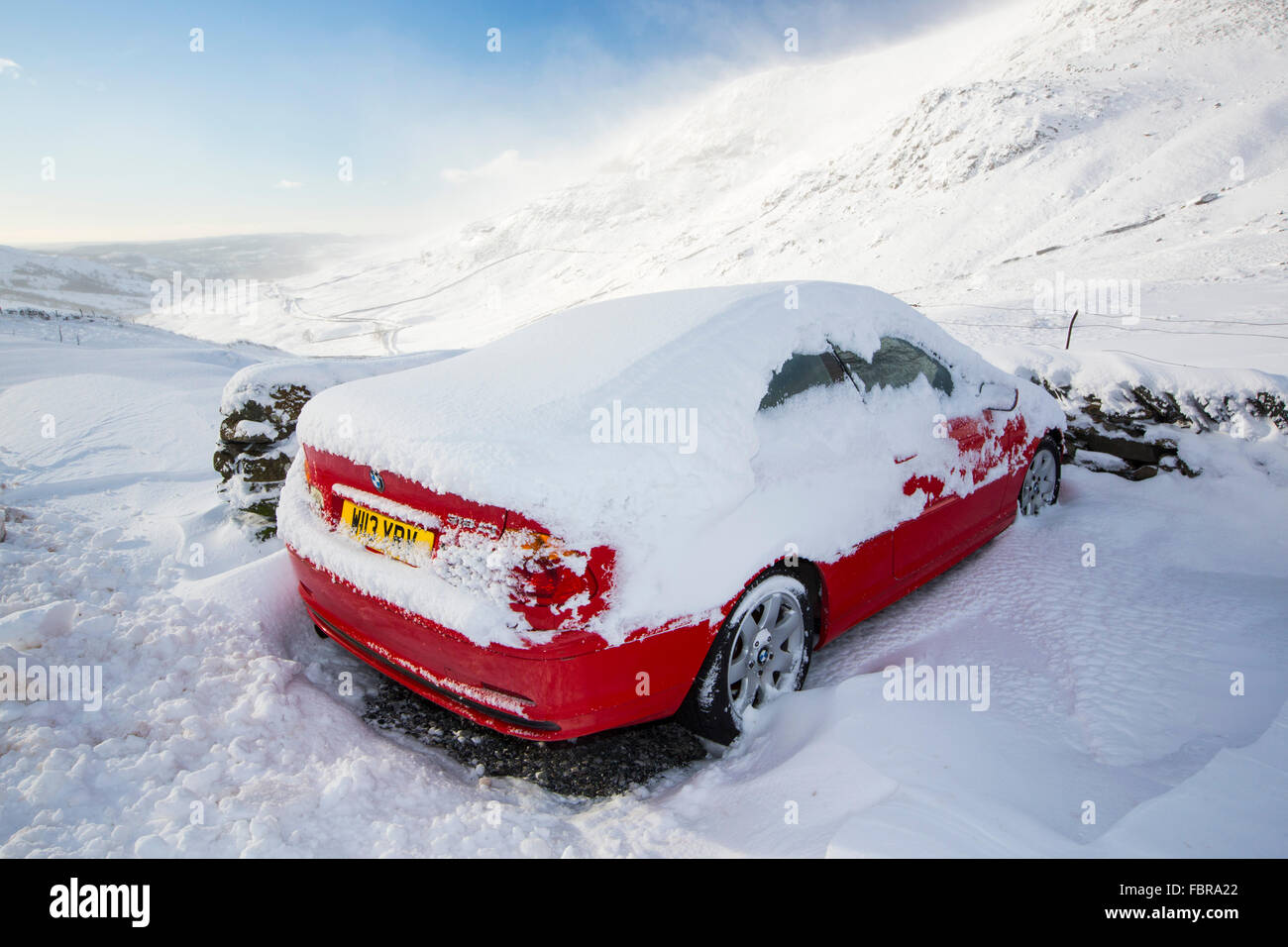 A BMW on kirkstone Pass in thick snow in the Lake District, UK Stock ...