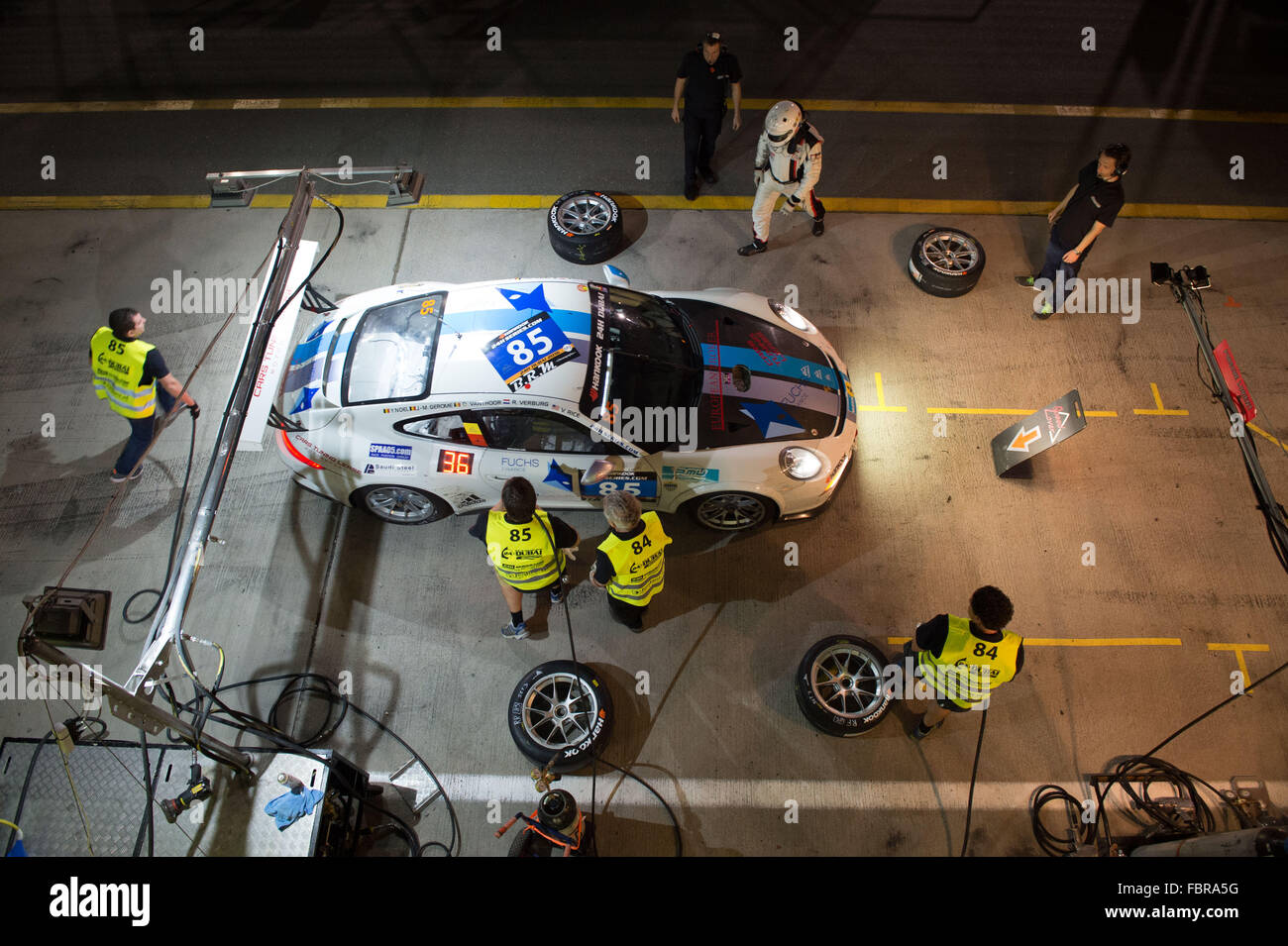 The Porsche 991 Cup of Team Speedlover comes in for a pit stop during ...