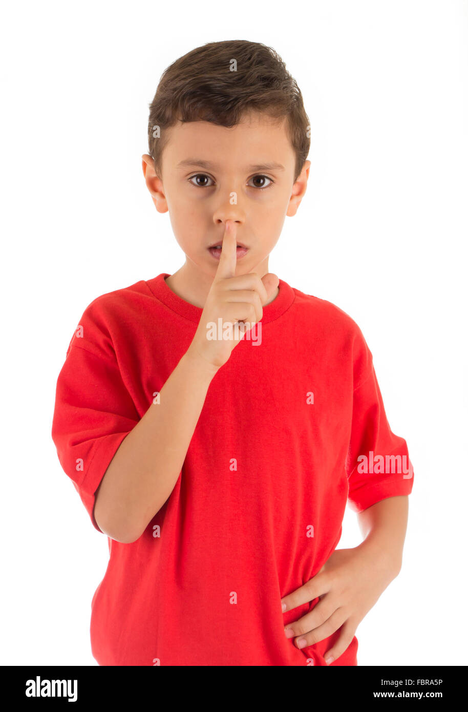Young boy asking silence Stock Photo - Alamy