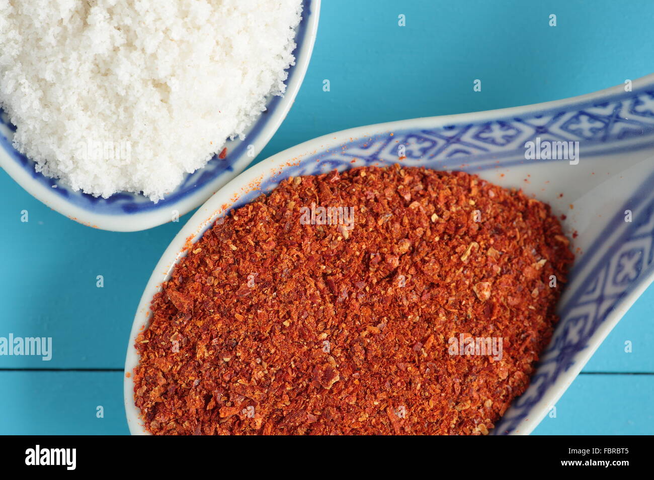 Food spices on a blue background Stock Photo - Alamy