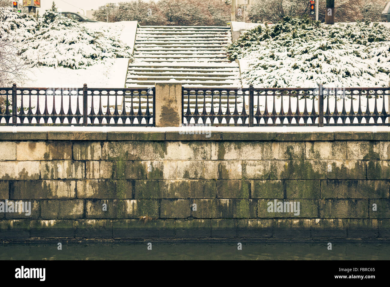 Old brick embankment of the river with stairs in winter Stock Photo - Alamy