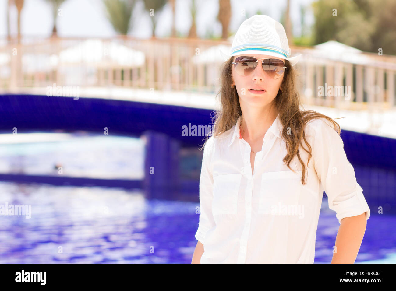 Woman standing swimming pool day hi-res stock photography and images ...