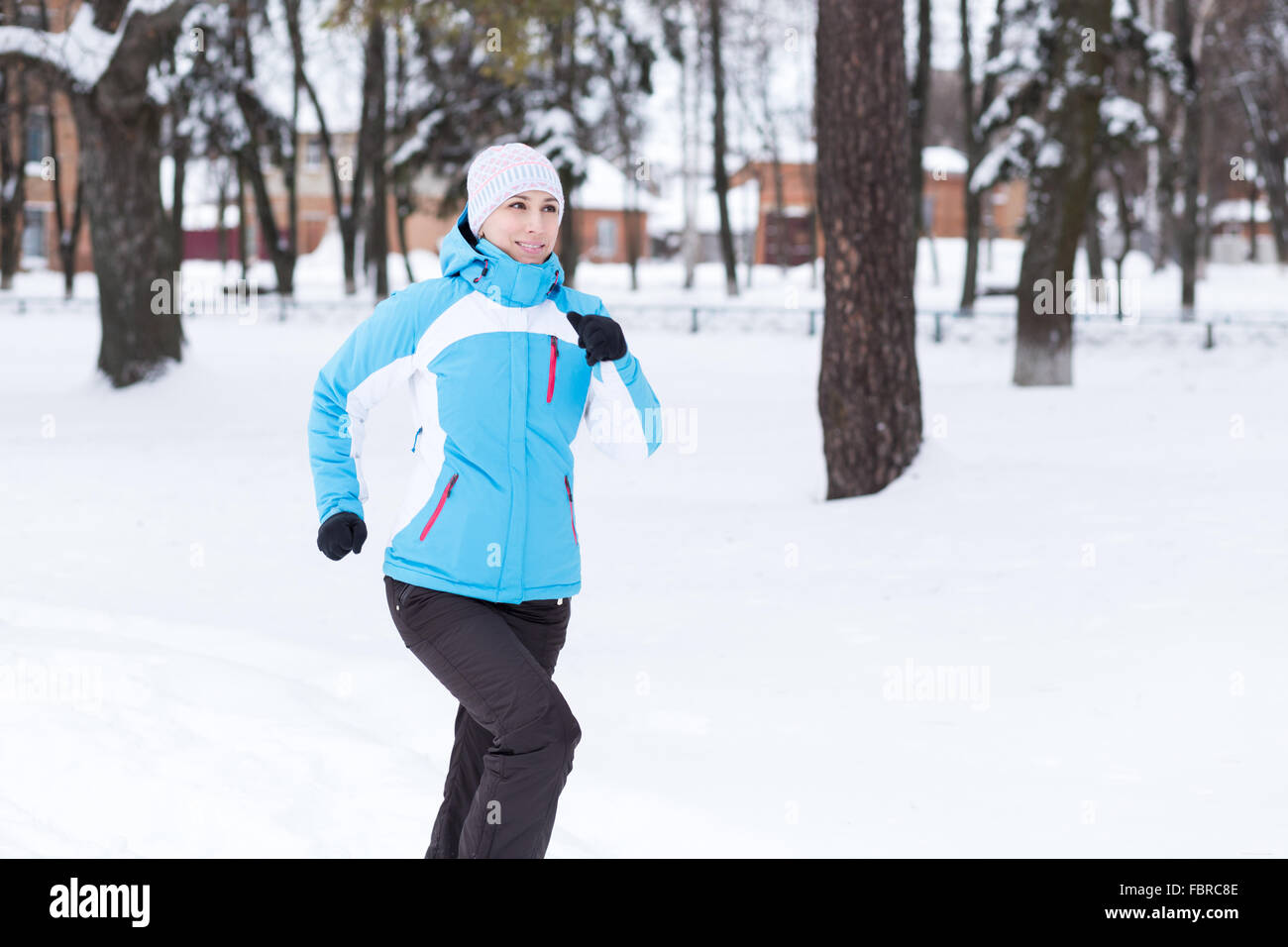 Sport cross country running action running winter snow cold hi-res ...