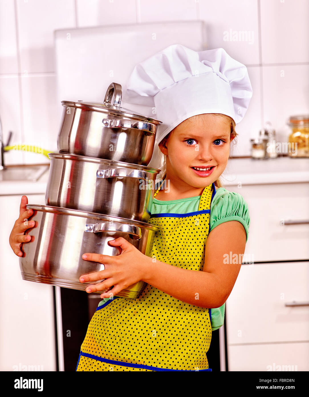 Child cooking at kitchen Stock Photo - Alamy