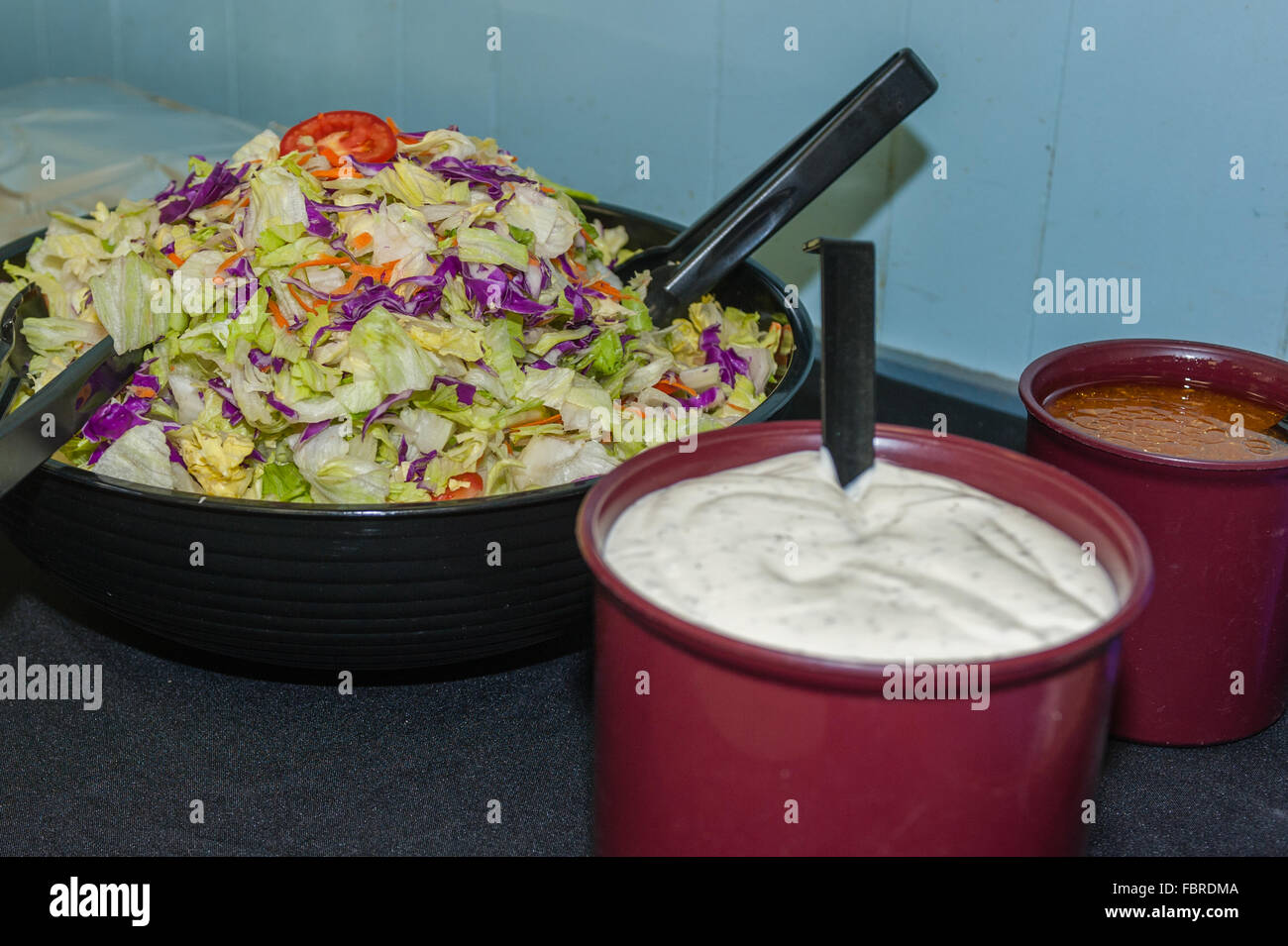 Salad and ranch dressing on the lunch buffet Stock Photo - Alamy