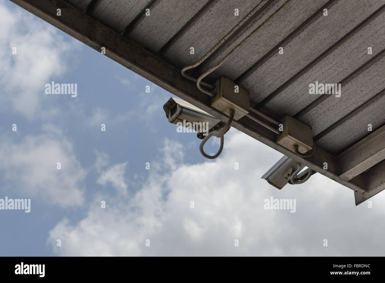 cctv attached to the edge of the roof Stock Photo - Alamy