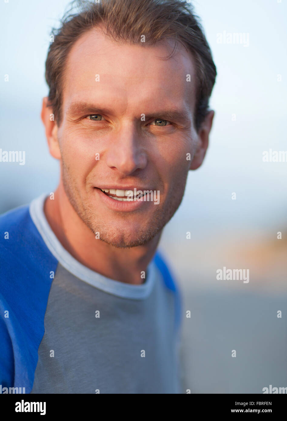 Smiling man portrait. Outdoor shoot Stock Photo - Alamy