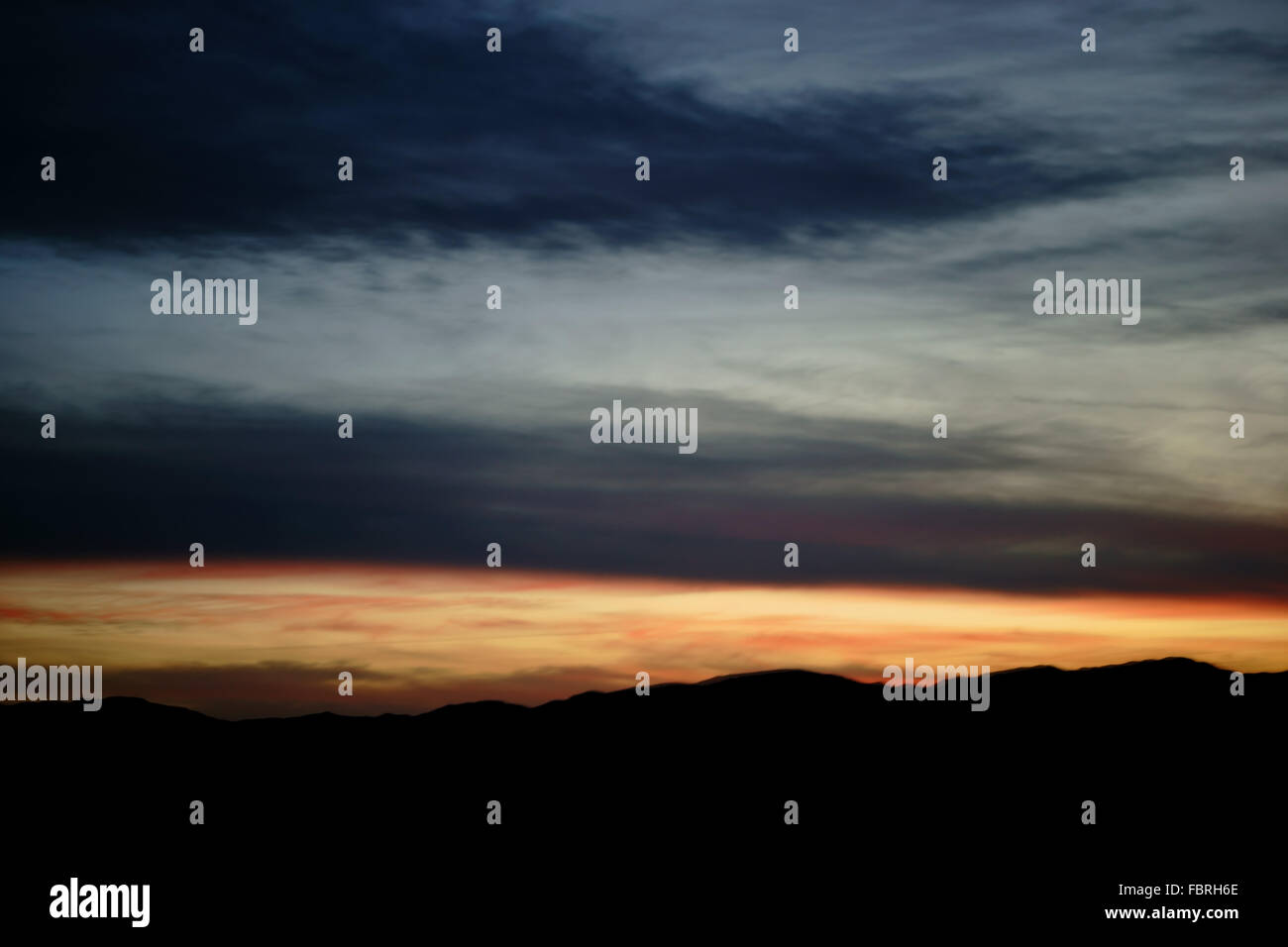 Twilight over the mountains Stock Photo - Alamy