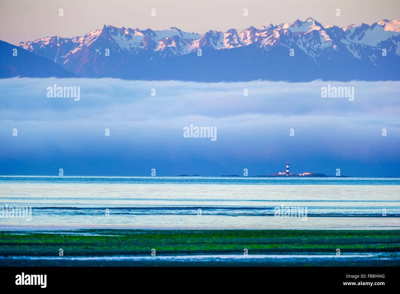 Race Rocks Lighthouse and Olympic Mountains seen from Witty's Lagoon on ...