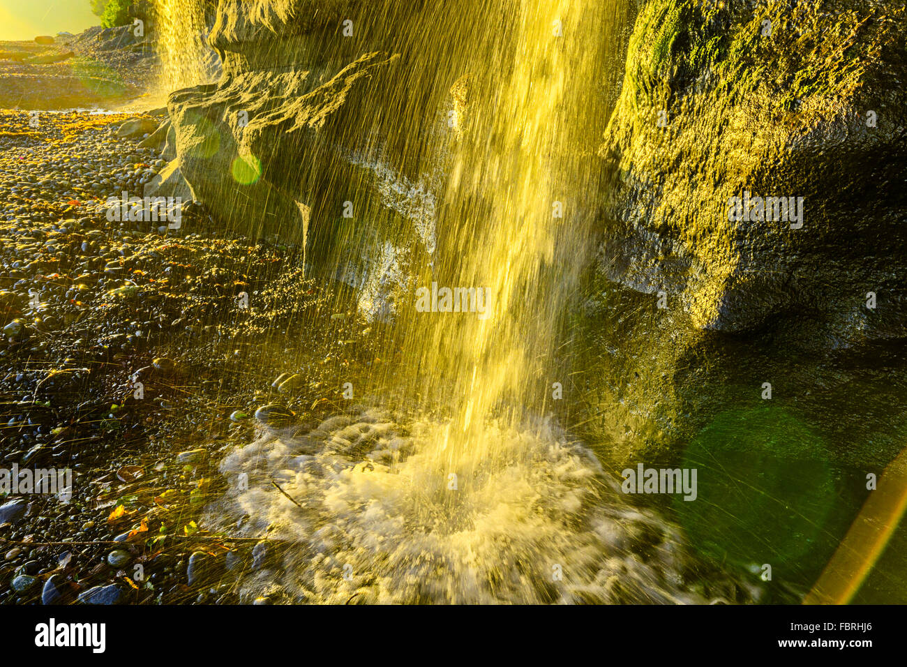Waterfall at sunset on Sandcut Beach Provincial Park, Vancouver Island ...