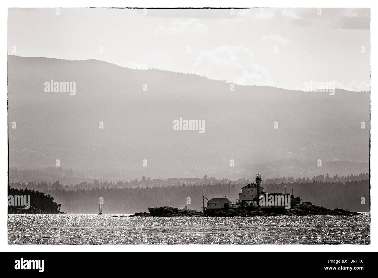 Entrance Island Lighthouse seen from Vancouver Island ferry, Canada ...
