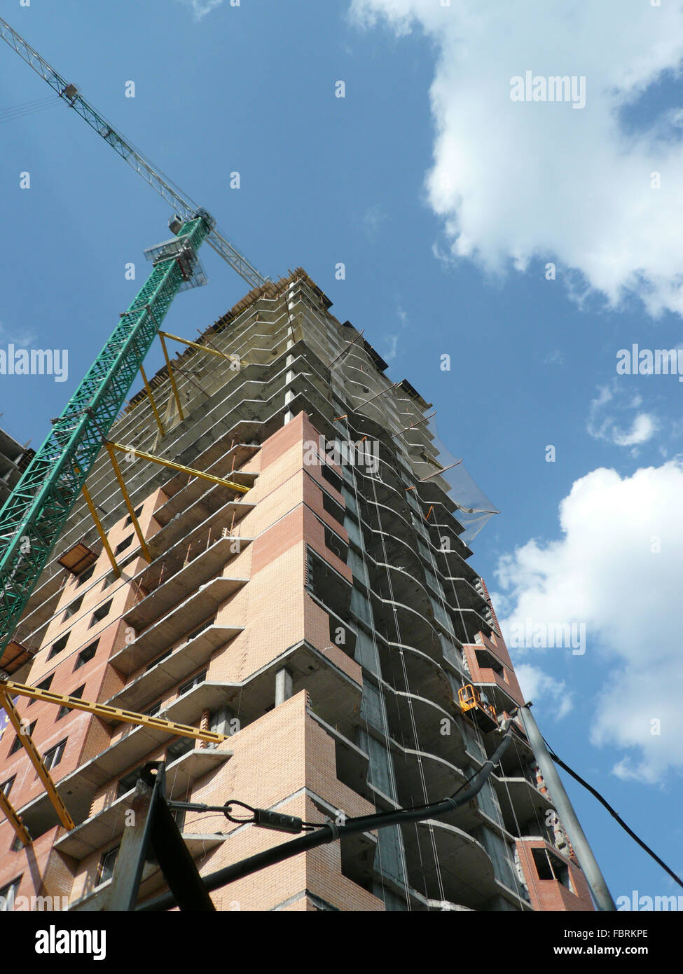 house develop with crane tower Stock Photo - Alamy