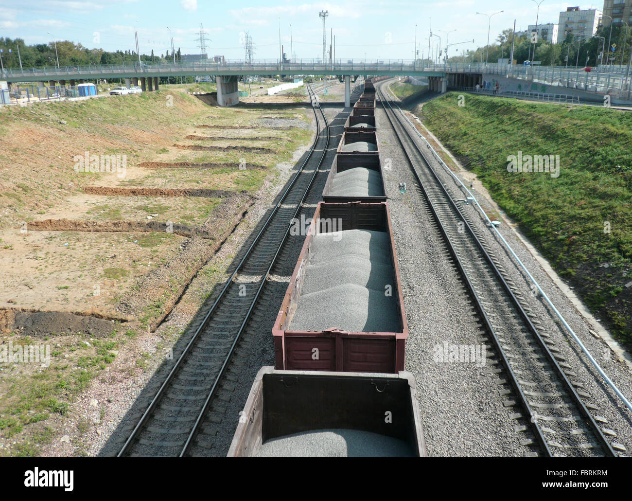 goods train with bulk cargo at summer sunny day Stock Photo - Alamy