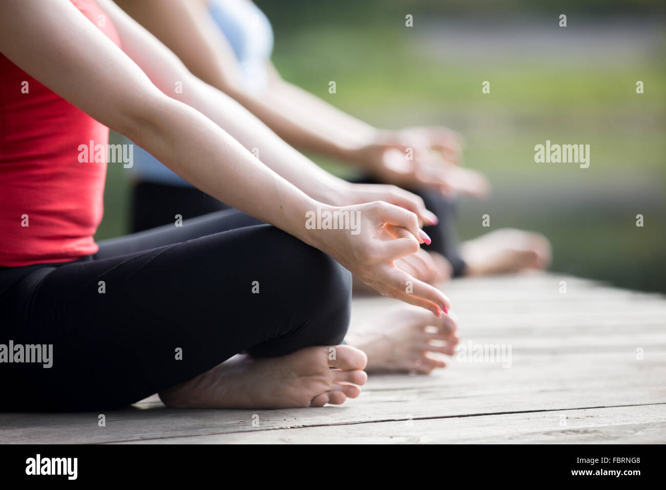 Woman yoga pose hands close up outside hi-res stock photography and ...