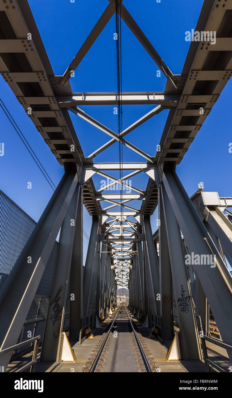 Modern railway steel bridge over highway Stock Photo - Alamy