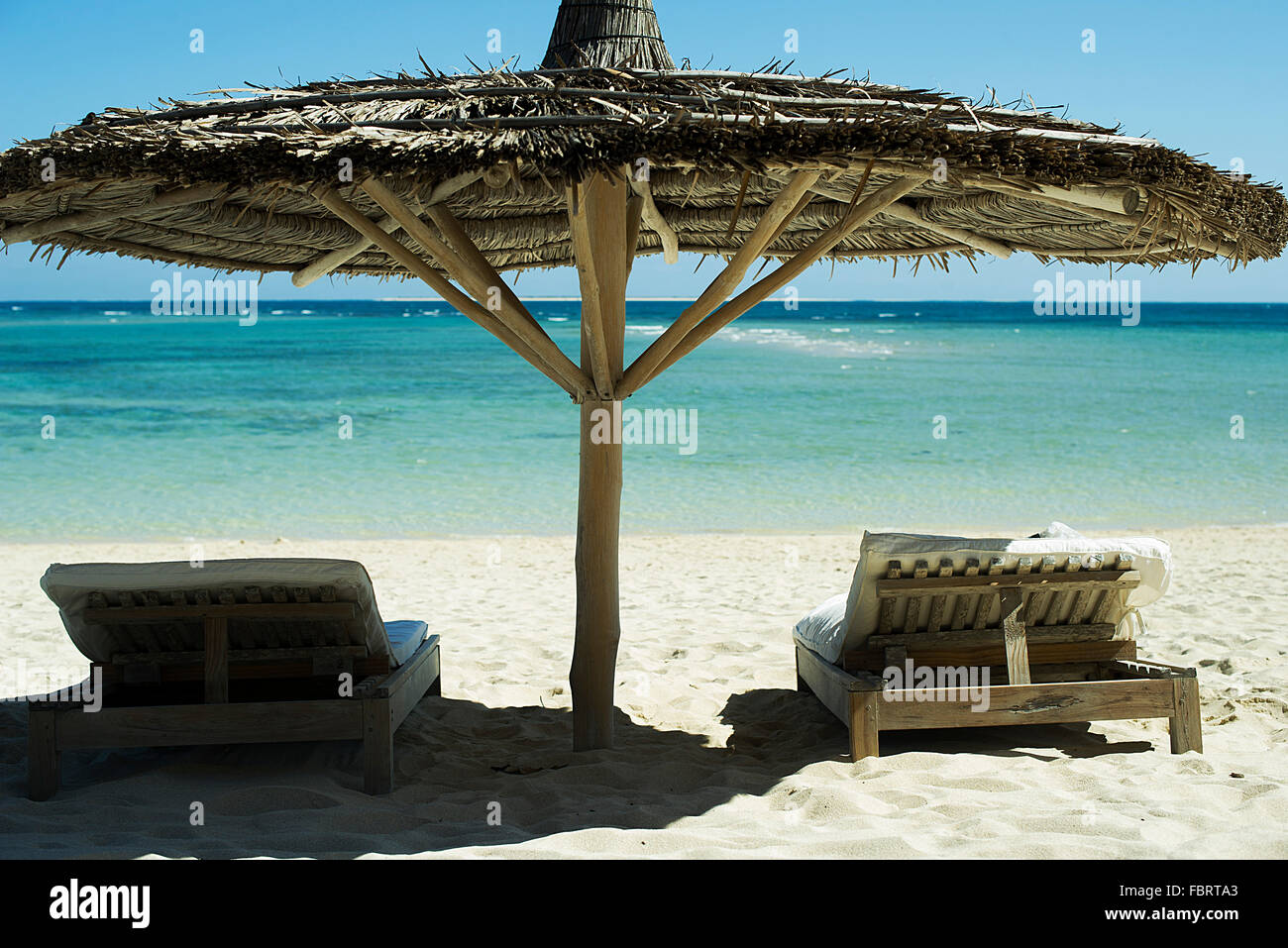 Foreground deck chairs on beach hi-res stock photography and images - Alamy