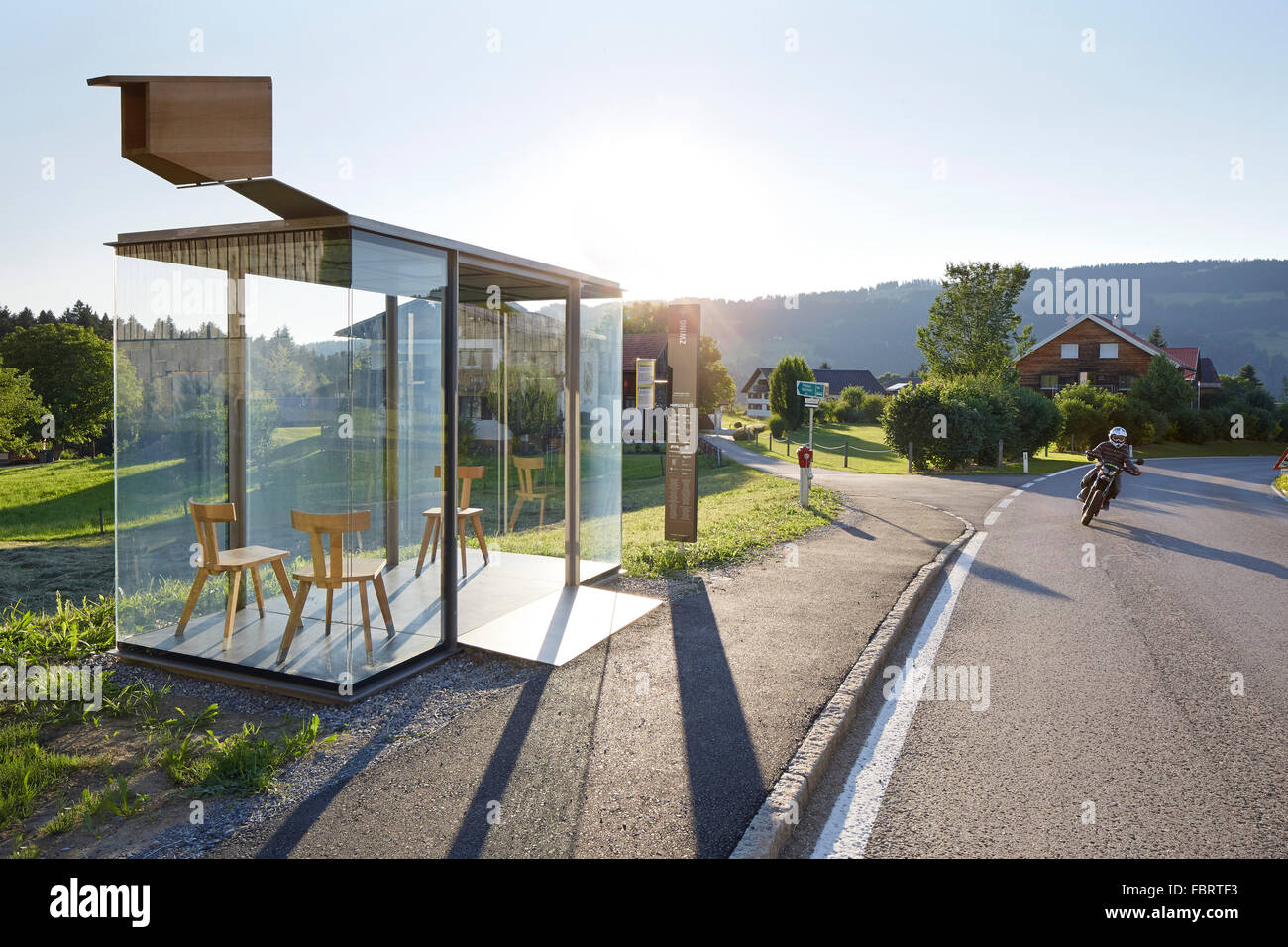 Back lit bus shelter on roadside. Bus Stop Zwing by Smiljan Radic ...