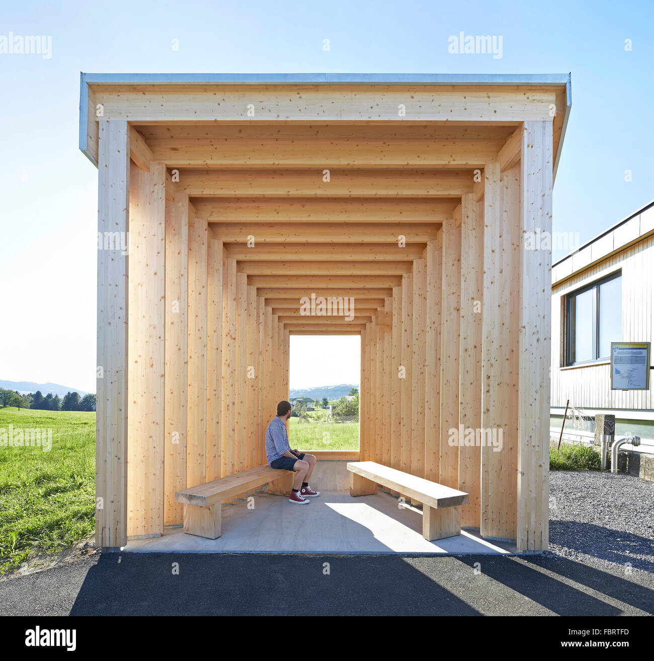 Timber structure with person waiting. Bus Stop Glatzegg by W Amateur ...