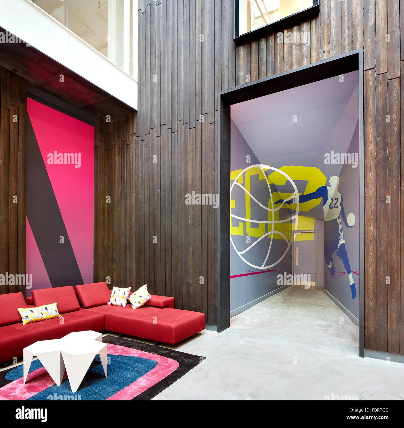 Lounge and entrance to basketball court. The Alphabeta Building, London ...