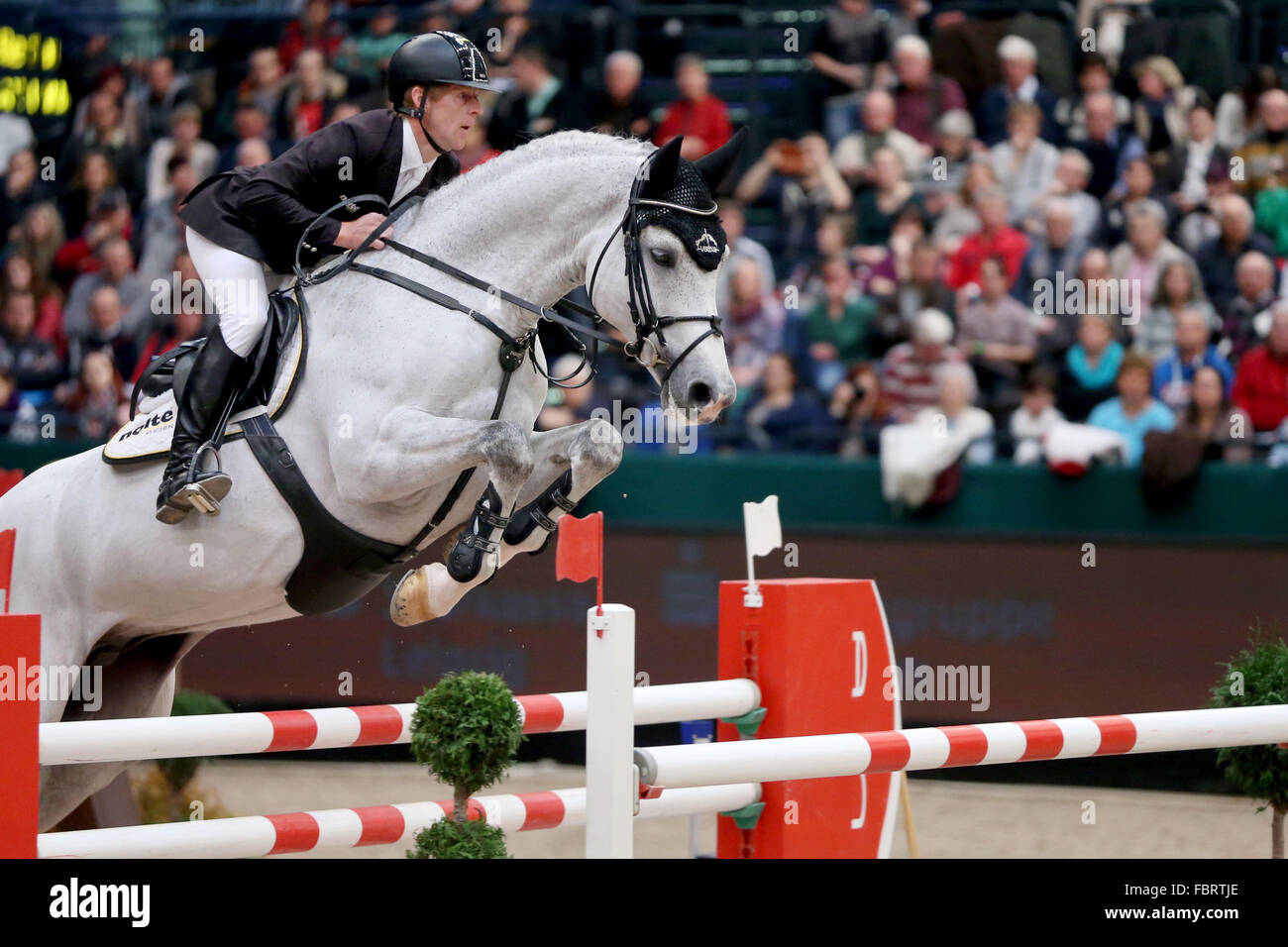 Leipzig, Germany. 17th Jan, 2016. Germany's Marcus Ehning riding ...