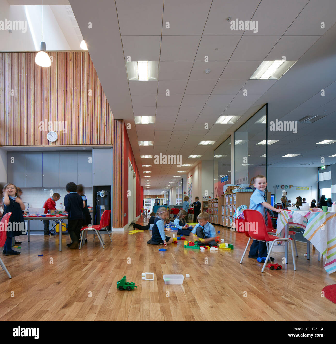 Ground floor corridor with children at play. Lairdsland Primary School ...