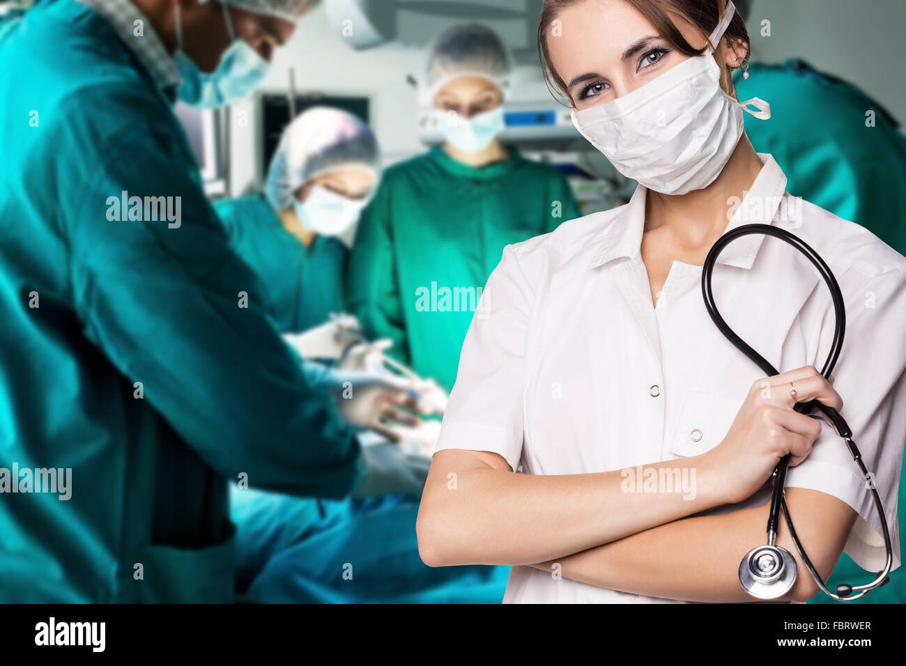 Surgery team operating Stock Photo - Alamy