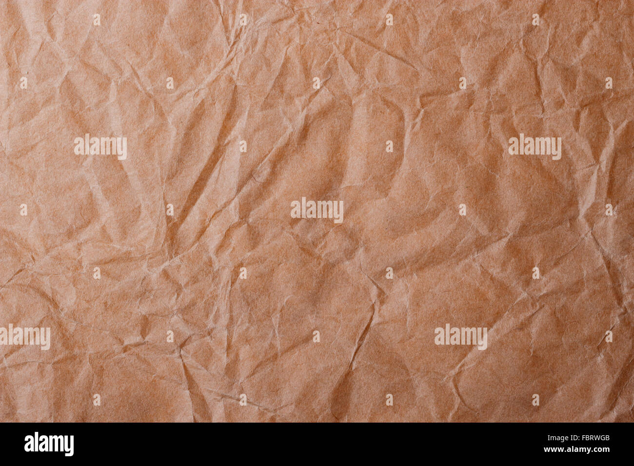 Brown crumpled folded paper for background or backdrop Stock Photo - Alamy
