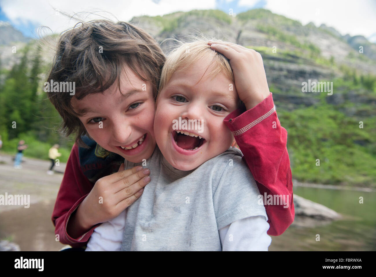 Young brothers laughing together, portrait Stock Photo - Alamy