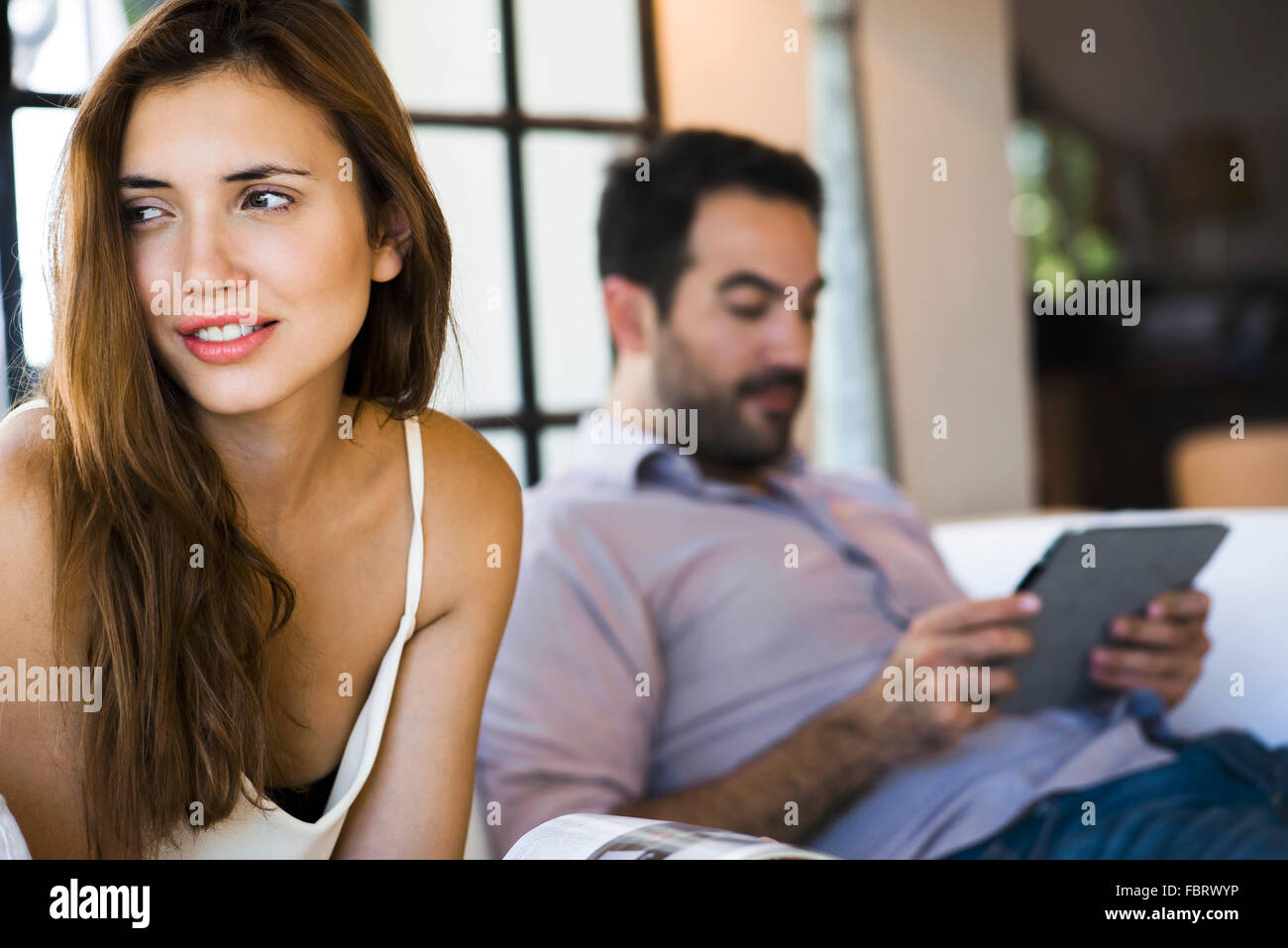 Couple at home Stock Photo - Alamy
