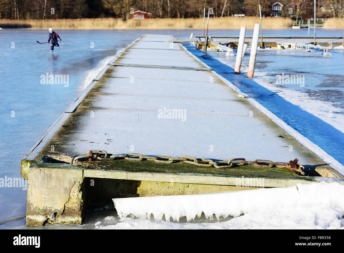 Winter landscape or seascape with floating bridge frozen solid in the ...