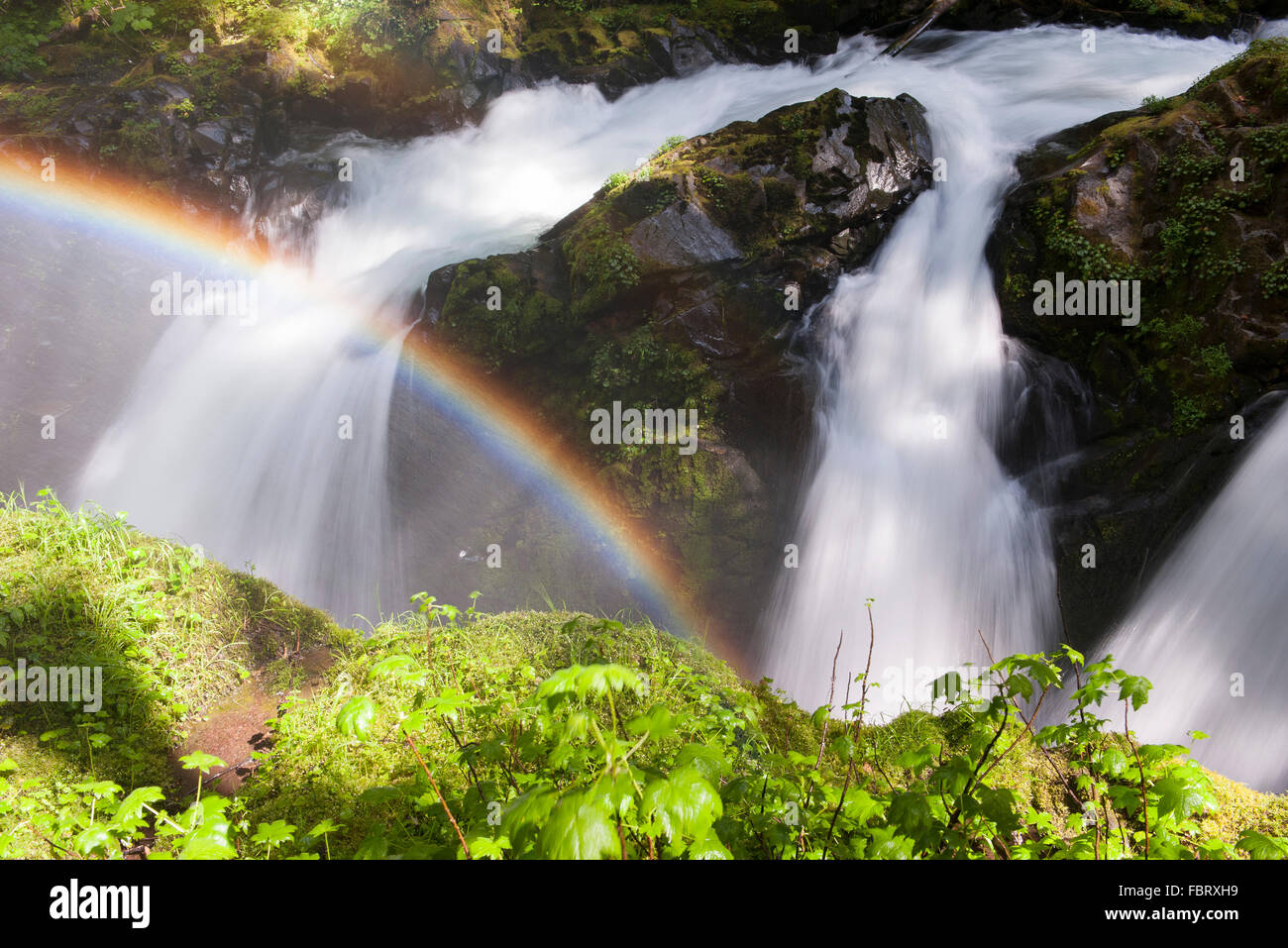 Rainbow Over A Waterfall Stock Photos & Rainbow Over A Waterfall Stock ...