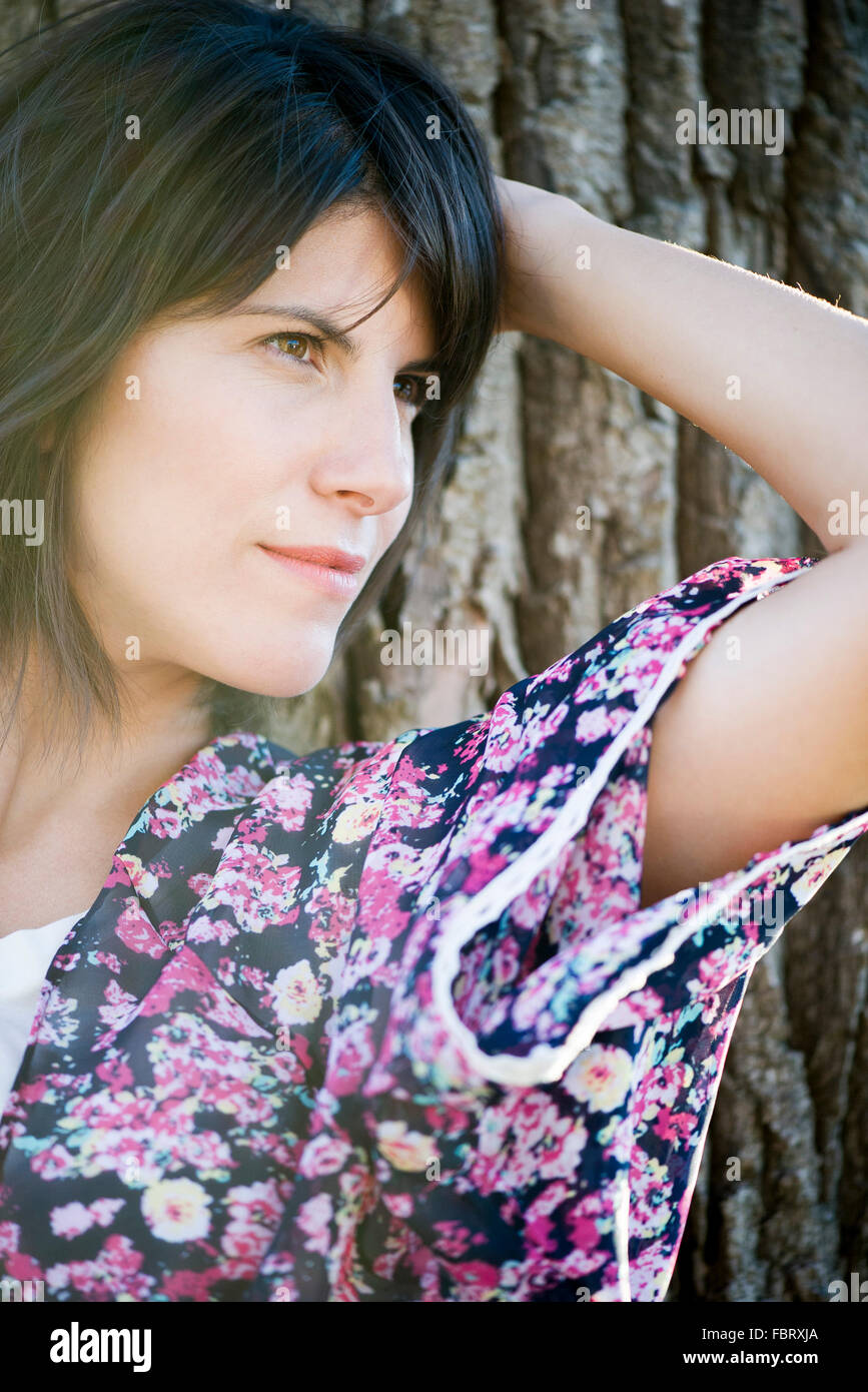Woman leaning head against her hand hi-res stock photography and images ...