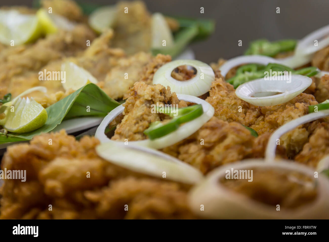 Prepared fried fish onion hi-res stock photography and images - Alamy