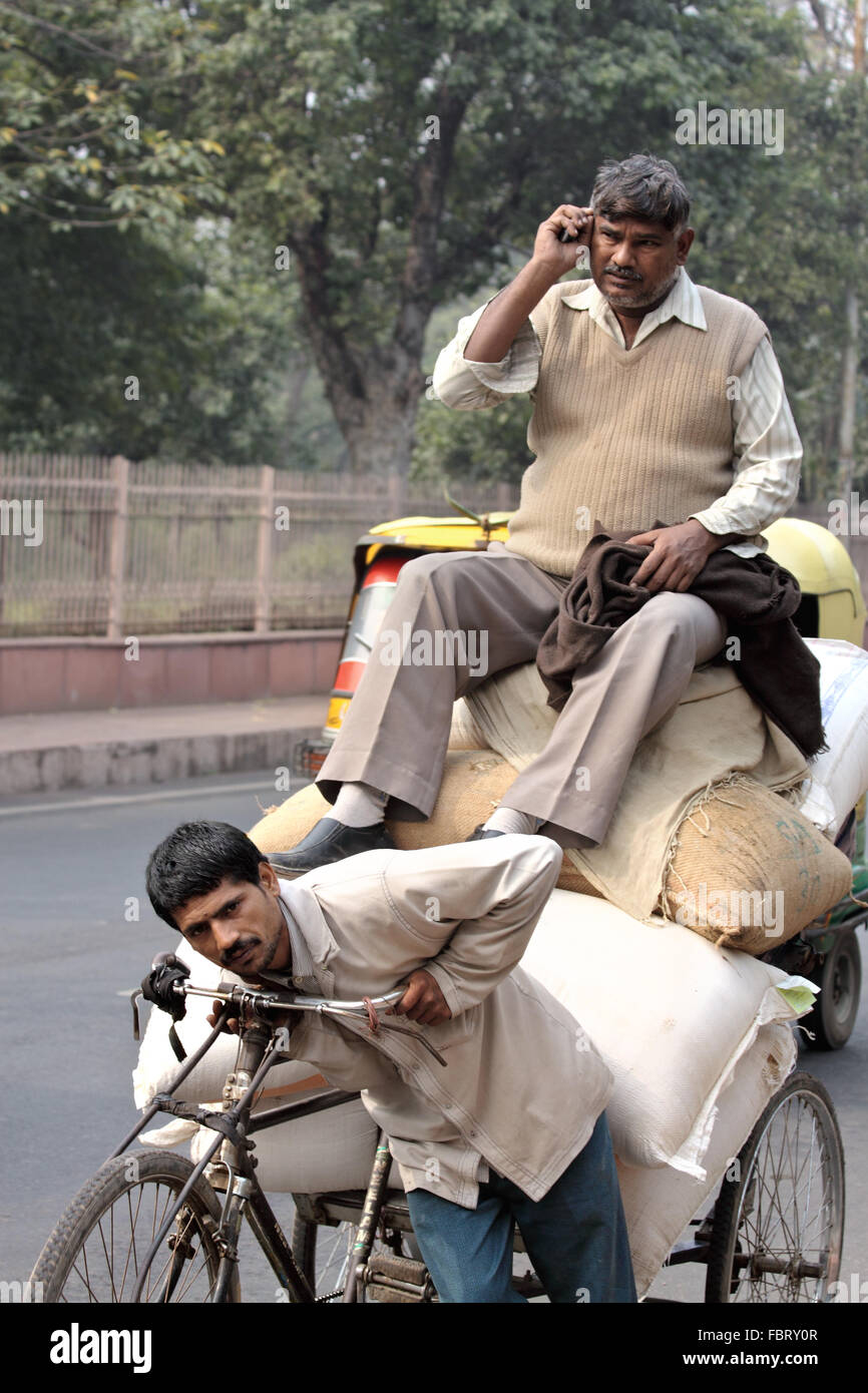 Bike rickshaw man and his customer in Agra, India Stock Photo - Alamy